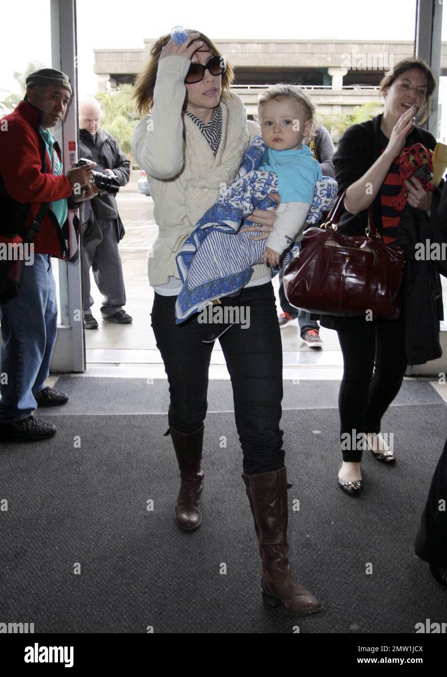 "Up in the Air" star Vera Farmiga carries her son Flynn as she arrives ...