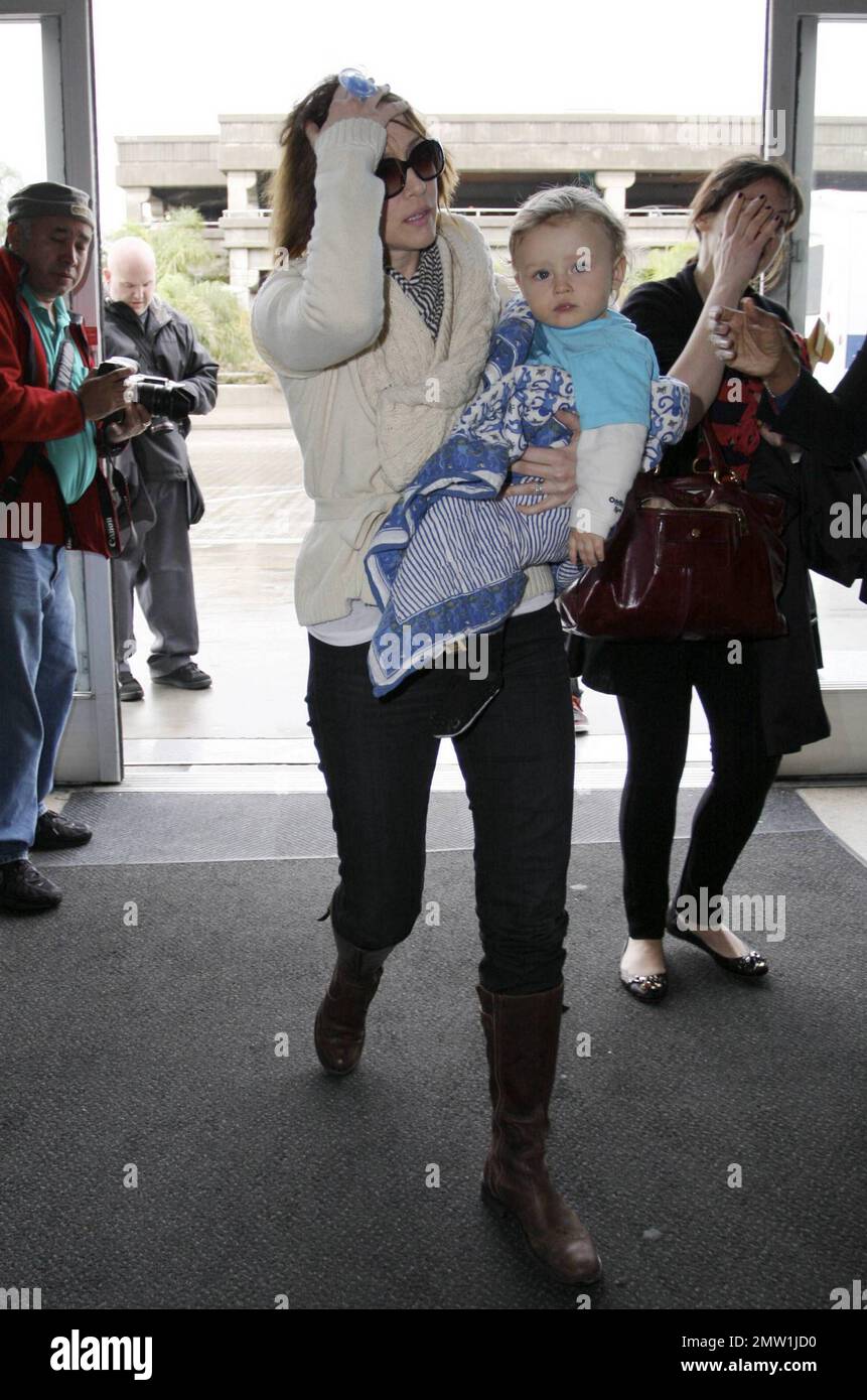 "Up in the Air" star Vera Farmiga carries her son Flynn as she arrives ...