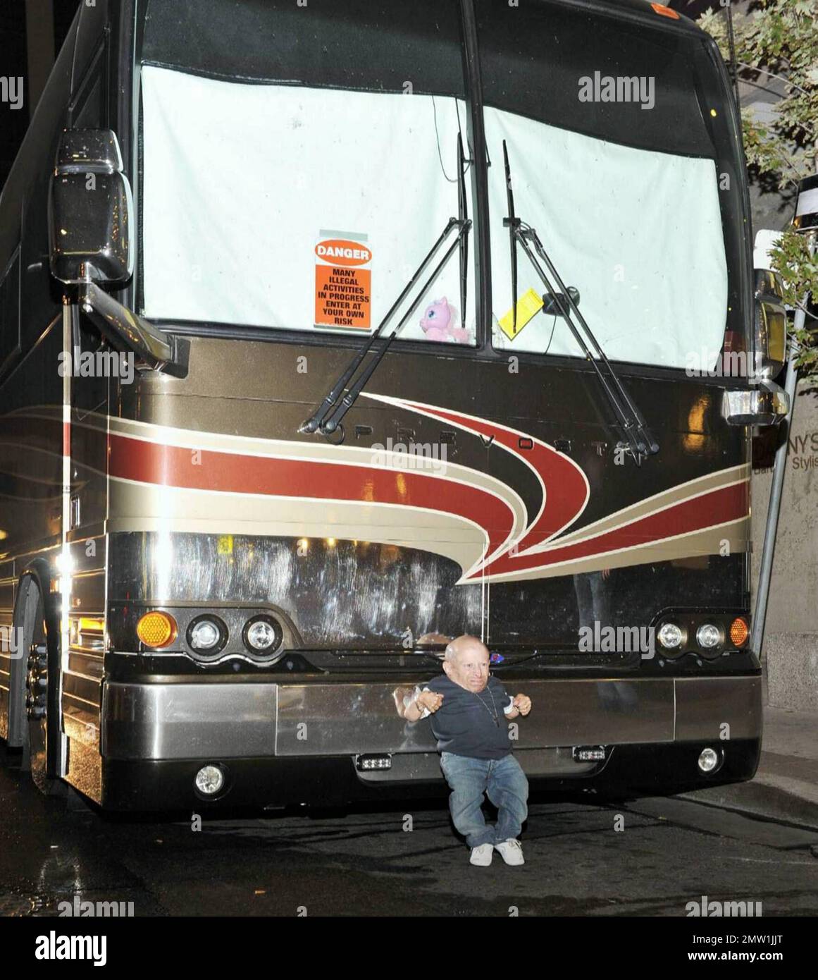 Verne Troyer shows off ride. The Mini Me actor posed with a tour bus ...