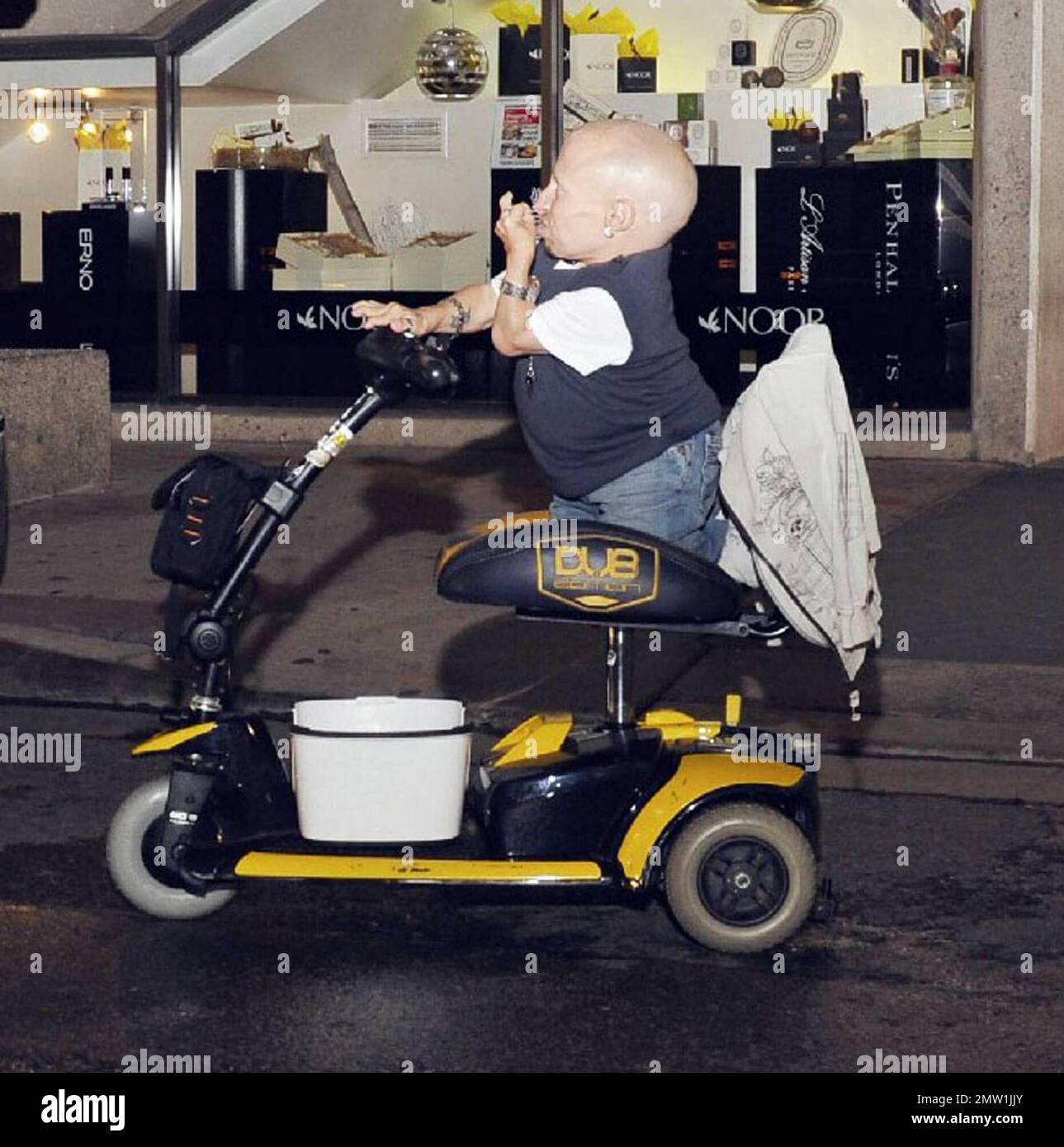 Verne Troyer shows off ride. The Mini Me actor posed with a tour bus ...