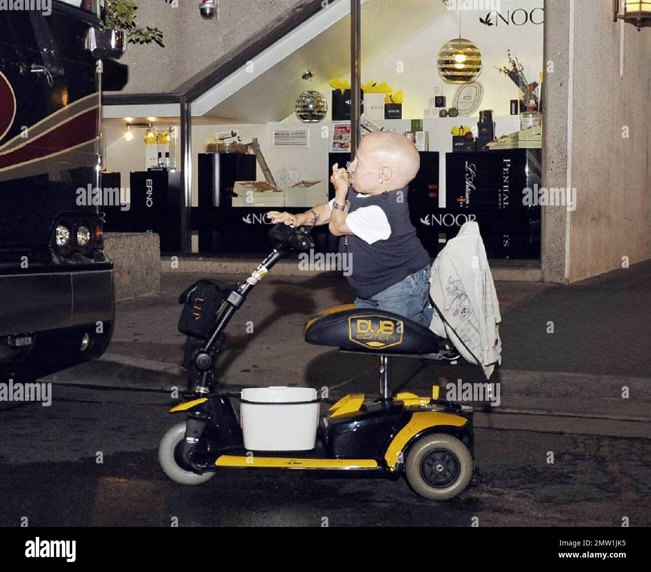 Verne Troyer shows off ride. The Mini Me actor posed with a tour bus ...