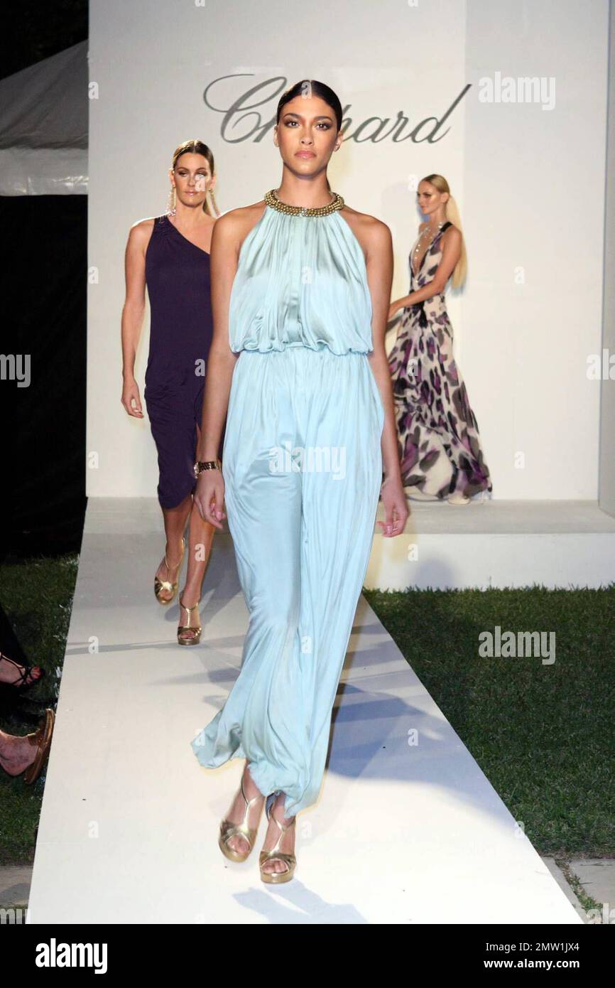 Models walk the runway during the Versace and Chopard Fashion Show at ...