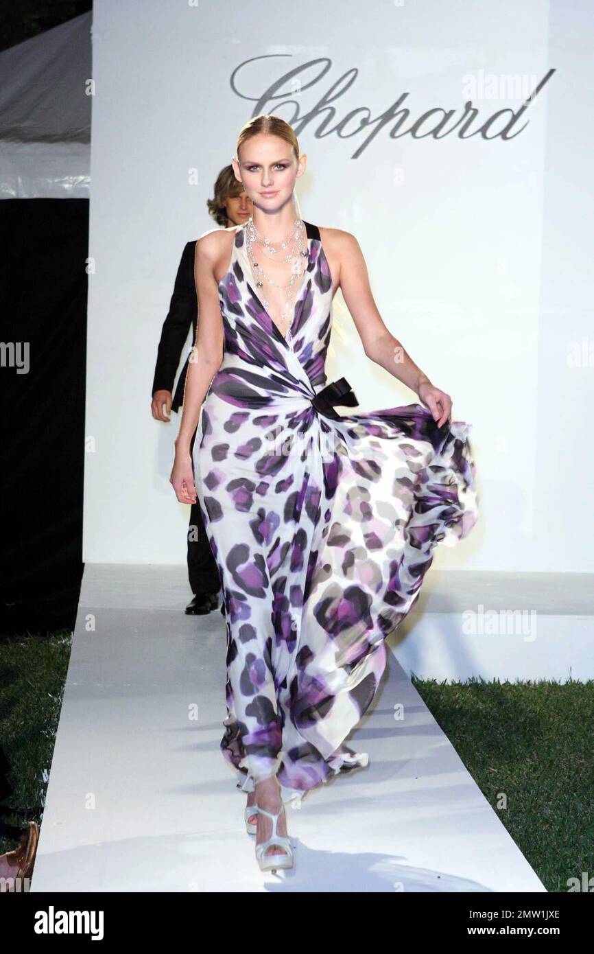 Models walk the runway during the Versace and Chopard Fashion Show at ...