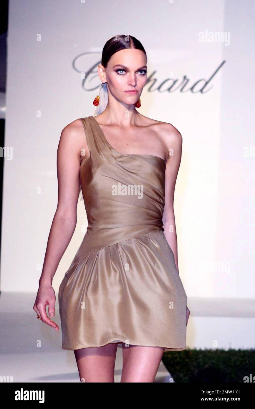 Models walk the runway during the Versace and Chopard Fashion Show at ...