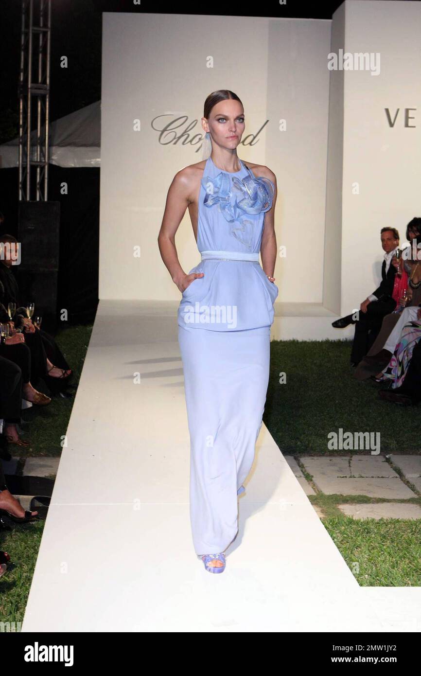 Models walk the runway during the Versace and Chopard Fashion Show at ...