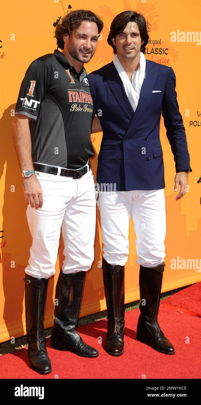 Polo players Rico Mansur and Nacho Figueras (R) arrive at the inaugural ...
