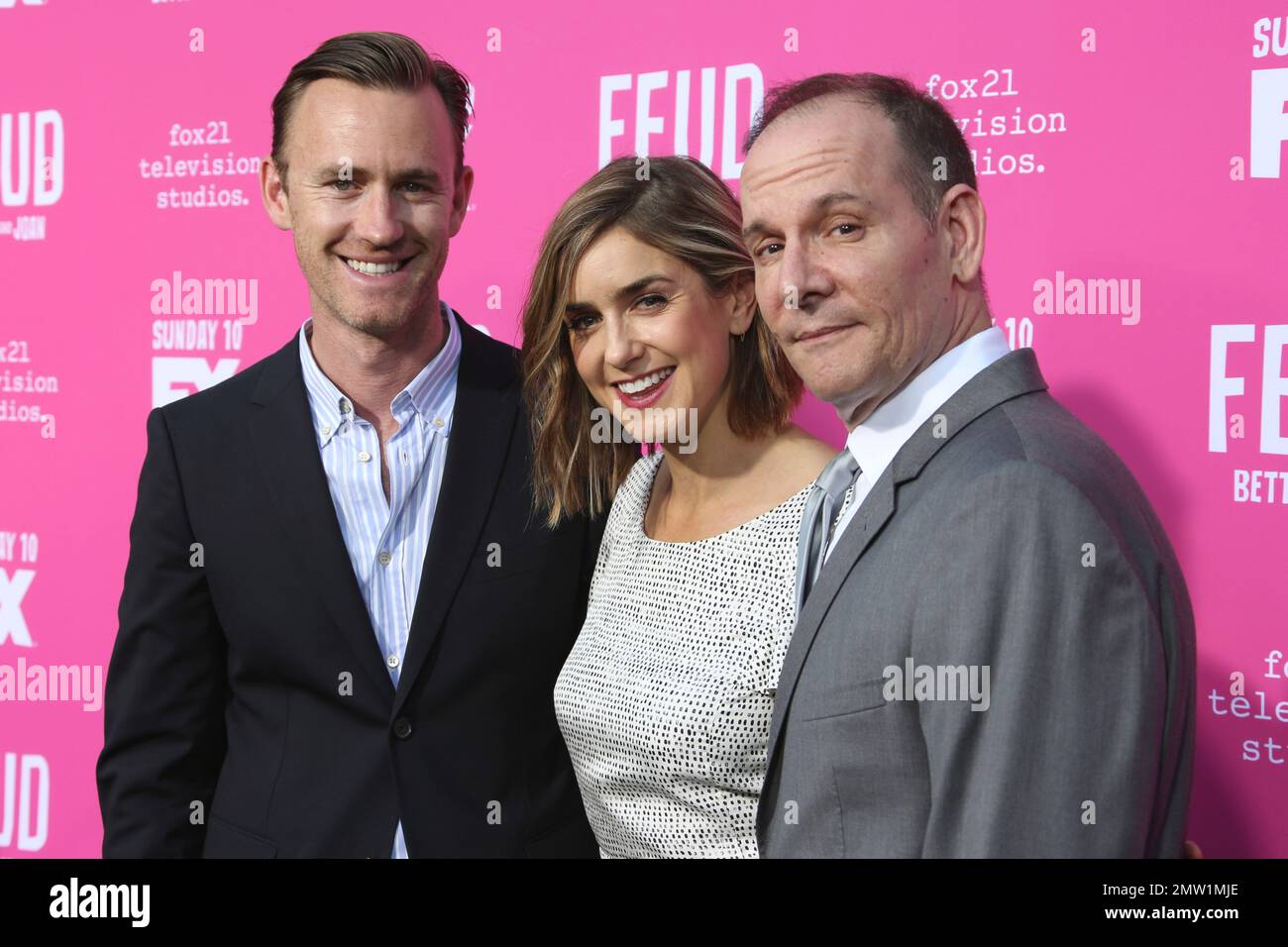 John J. Gray, from left, Gina Welch and Tim Minear arrive at the "Feud ...