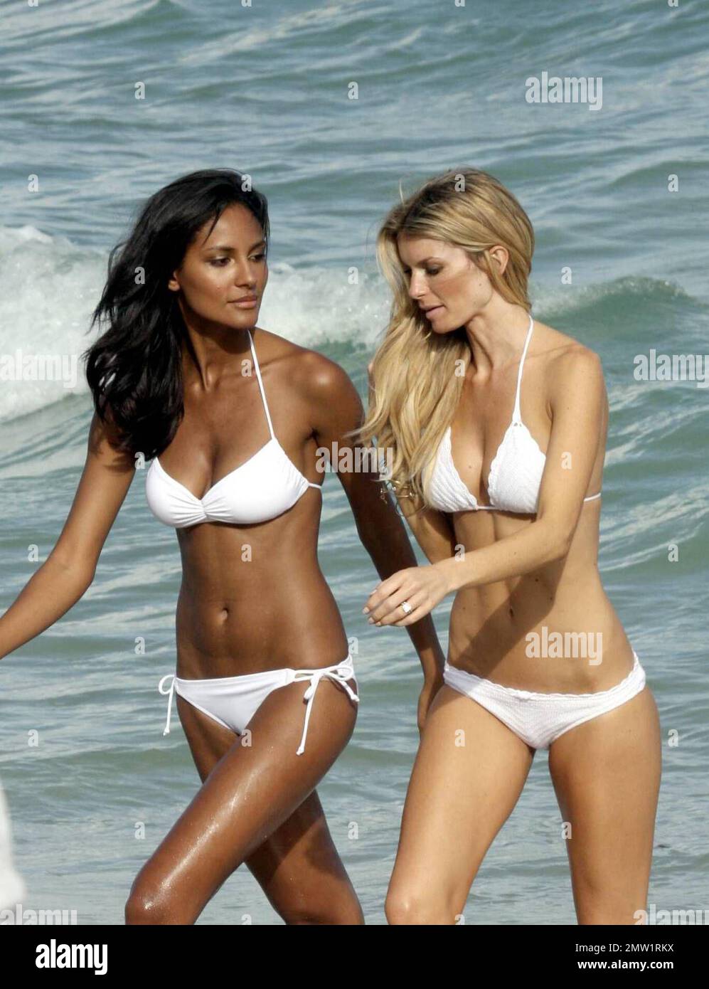 The Victoria's Secret Angels frolic in the surf during a photoshoot on South Beach as Angel and ...