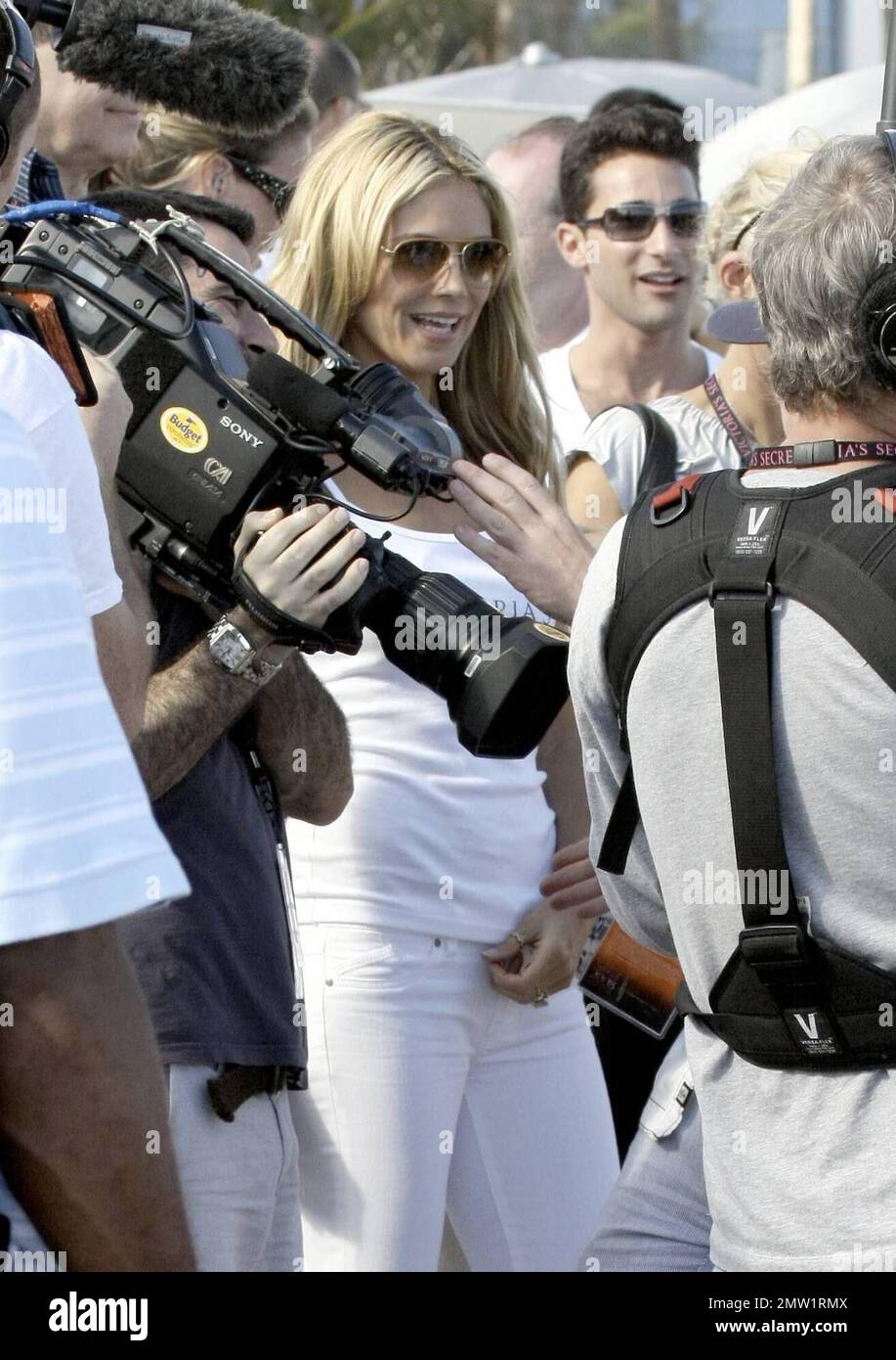 The Victoria's Secret Angels frolic in the surf during a photoshoot on ...