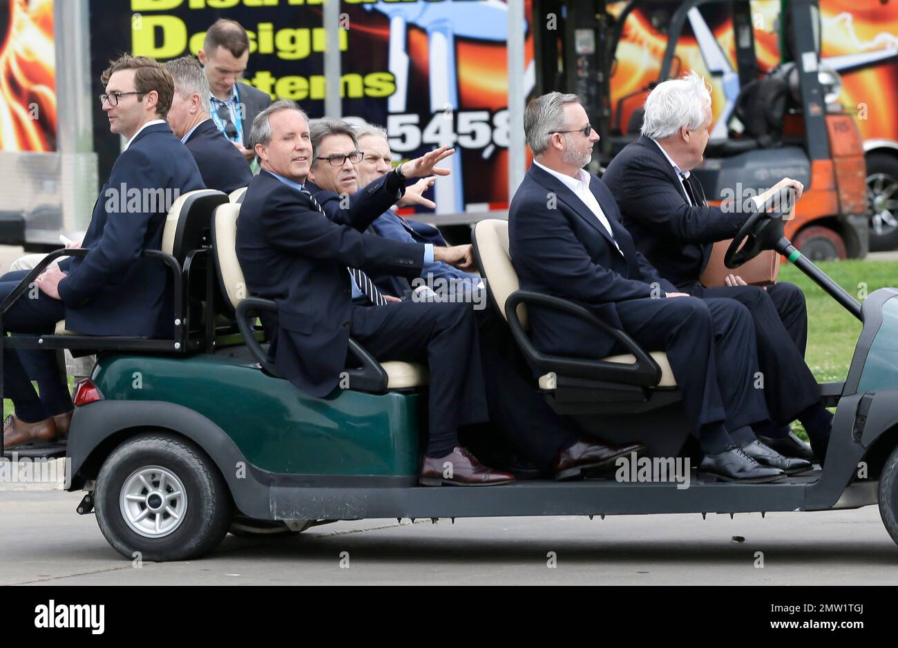 Energy Secretary Rick Perry, center left, talks with Texas Attorney ...