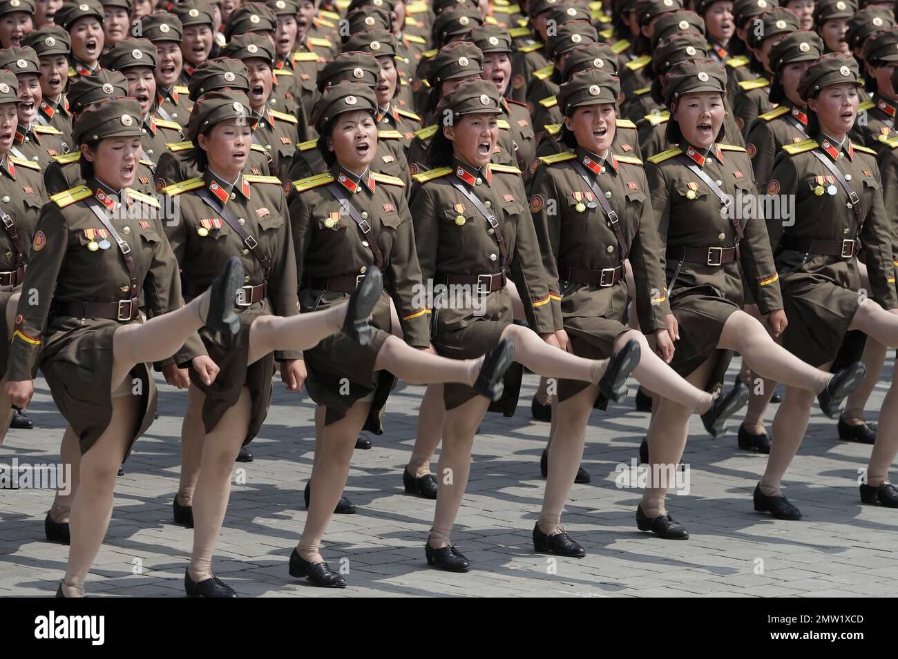 Women soldiers march across Kim Il Sung Square during a military parade ...