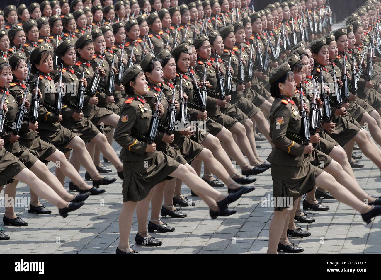 Women soldiers march across Kim Il Sung Square during a military parade ...