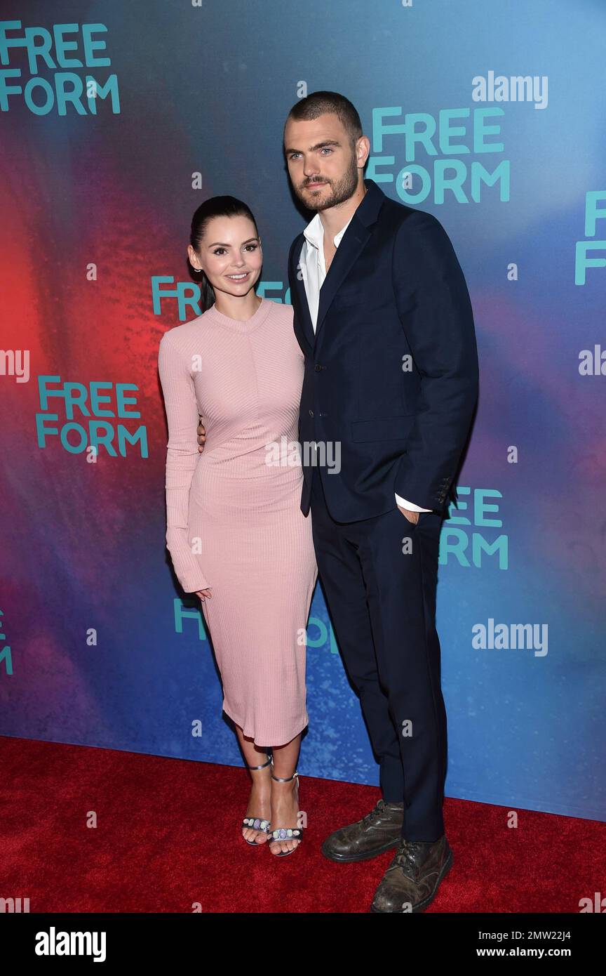 Actors Eline Powell, left, and Alex Roe attend the ABC Freeform 2017 ...