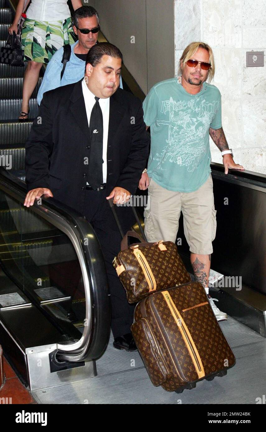 Exclusive!! Vince Neil arrives at Palm Beach International Airport and ...