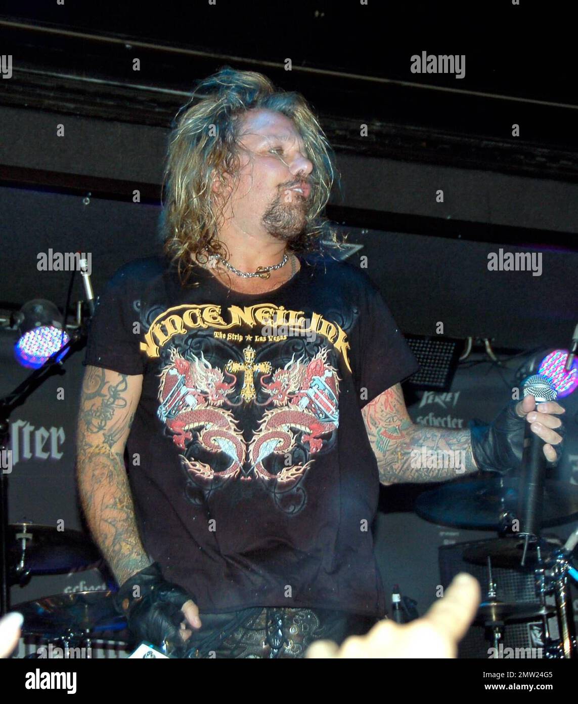 Vince Neil performs at the grand opening of the first Dr. Feelgood's ...
