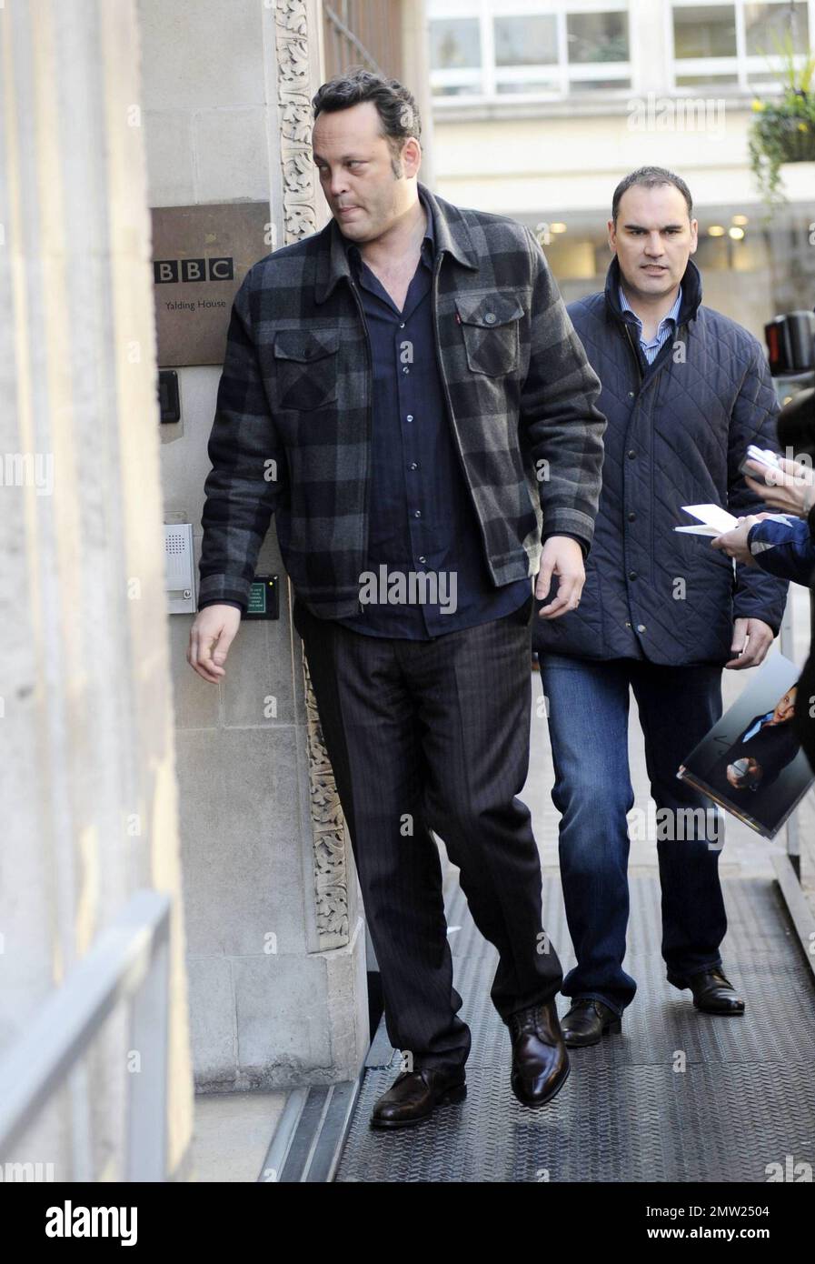 New father Vince Vaughn signs autographs for fans as he arrives and ...