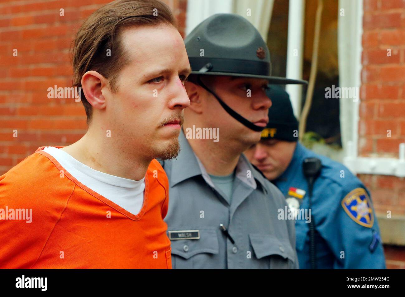 FILE - In this Oct. 31, 2014, file photo, Eric Frein is escorted by ...