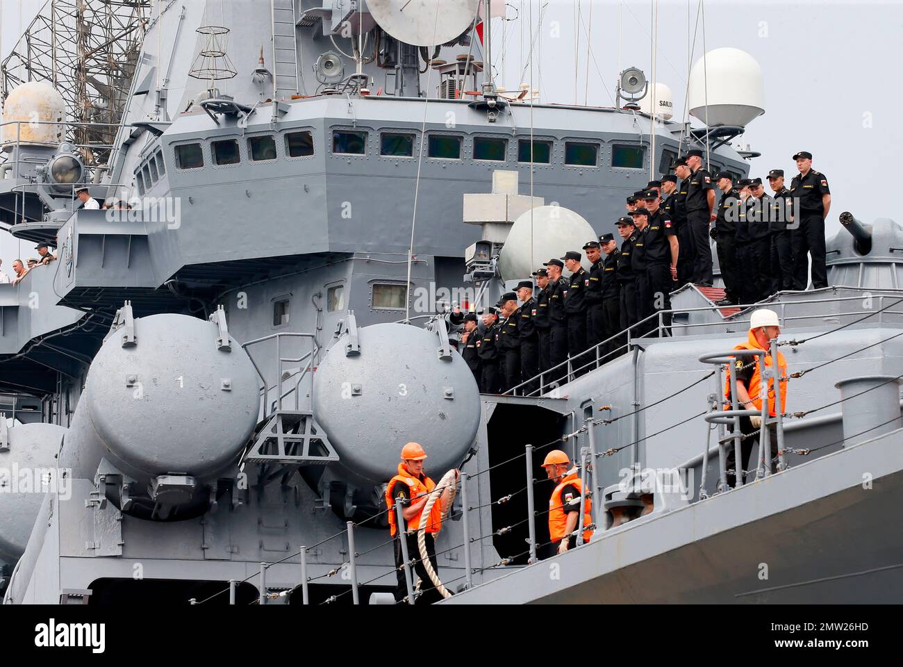 Russian sailors stand at attention on board the guided missile cruiser ...