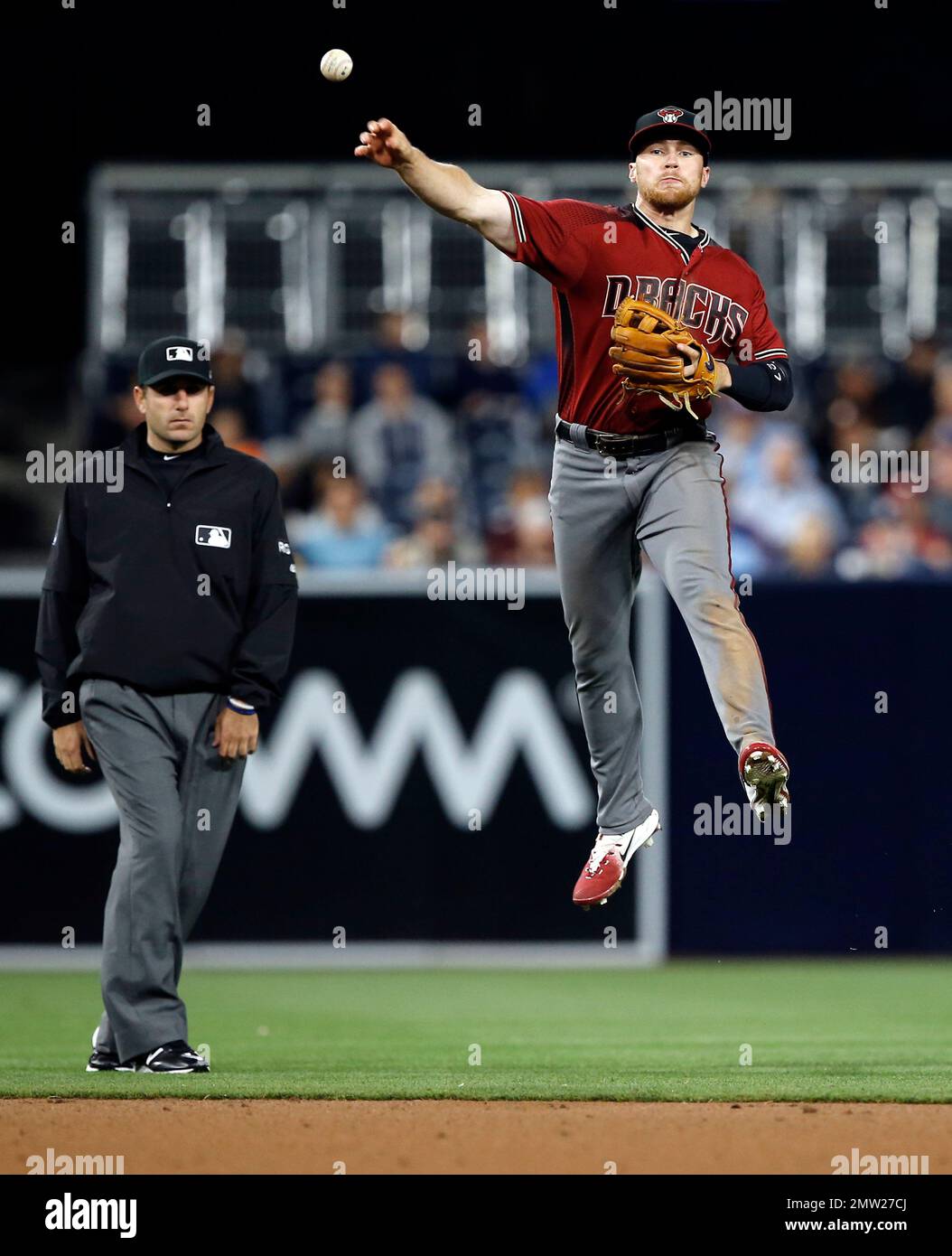 Arizona Diamondbacks second baseman Brandon Drury, right, leaps to ...