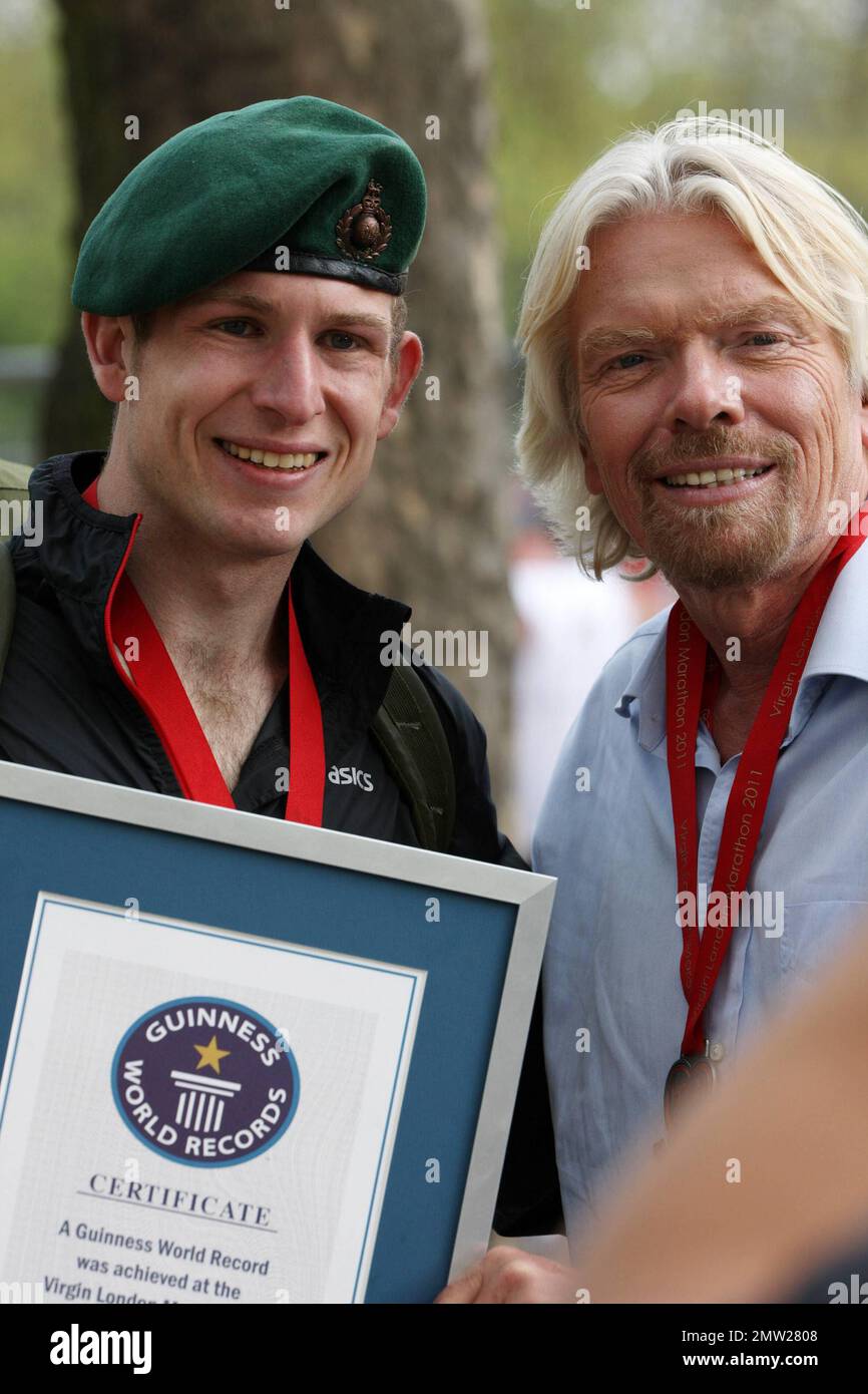 Sir Richard Branson poses with a Guinness World Record breaker at the ...