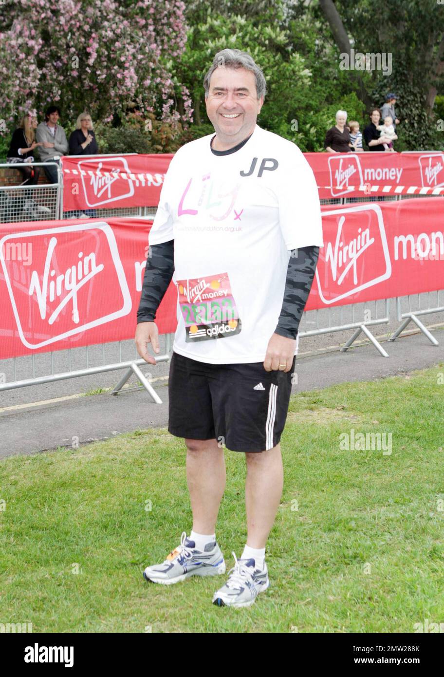 Jonathan Pearce poses for photographers at the celebrity start during ...