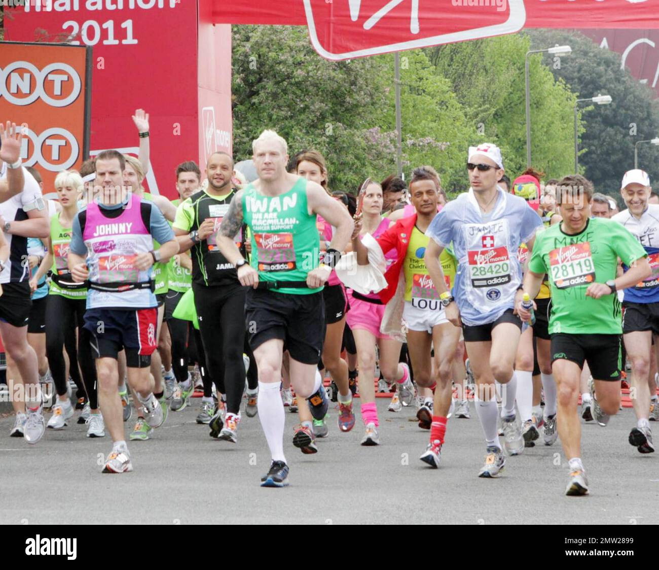 Celebrities including Iwan Thomas at the beginning of their run during ...