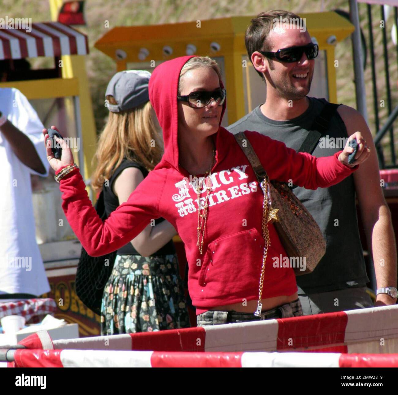 Actress Taryn Manning wins a carnival game at the Virgin MobileÕs ...
