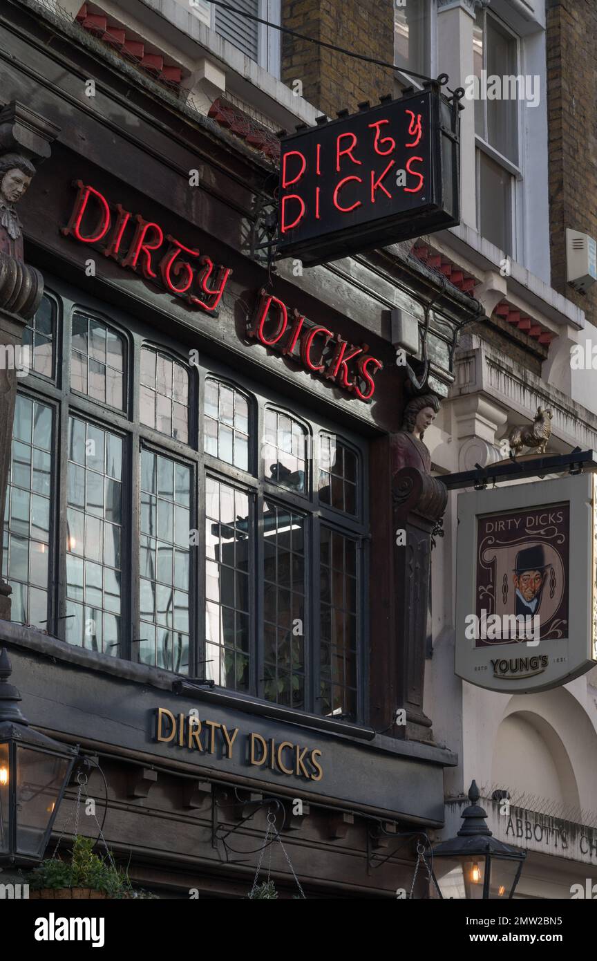 Exterior of Dirty Dicks pub and restaurant showing traditional painted ...