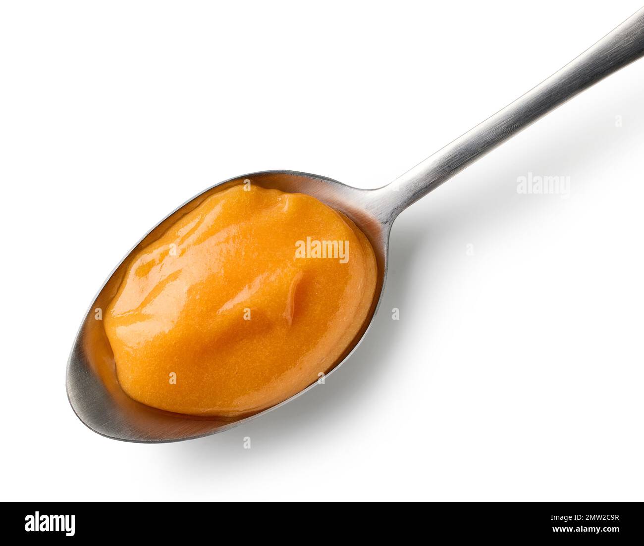 spoon of vegetable puree isolated on white background, top view Stock ...