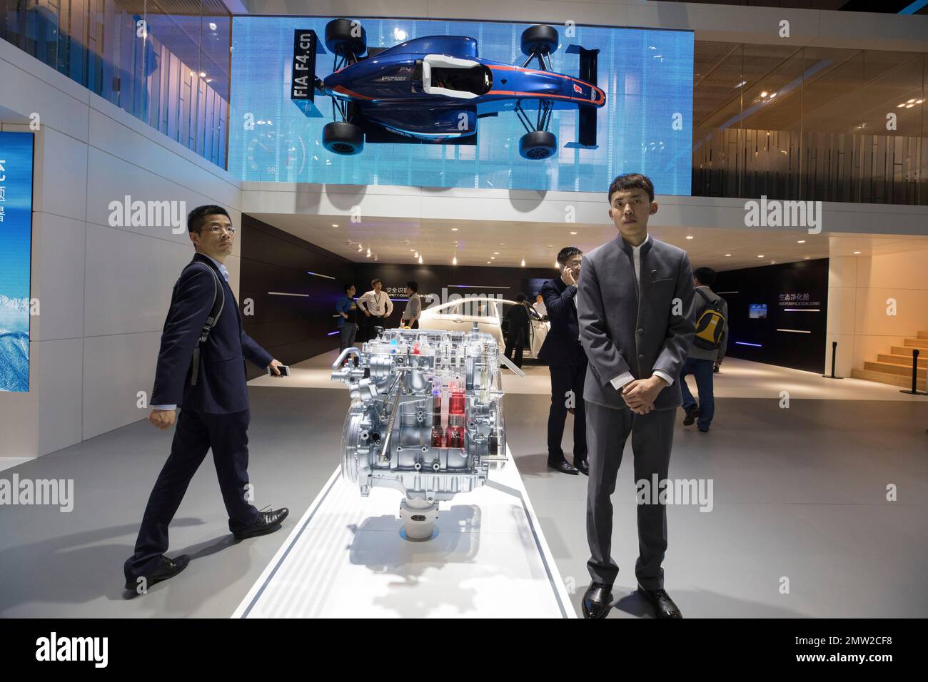 Visitors at the Geely stand during the Auto Shanghai 2017 show at the ...