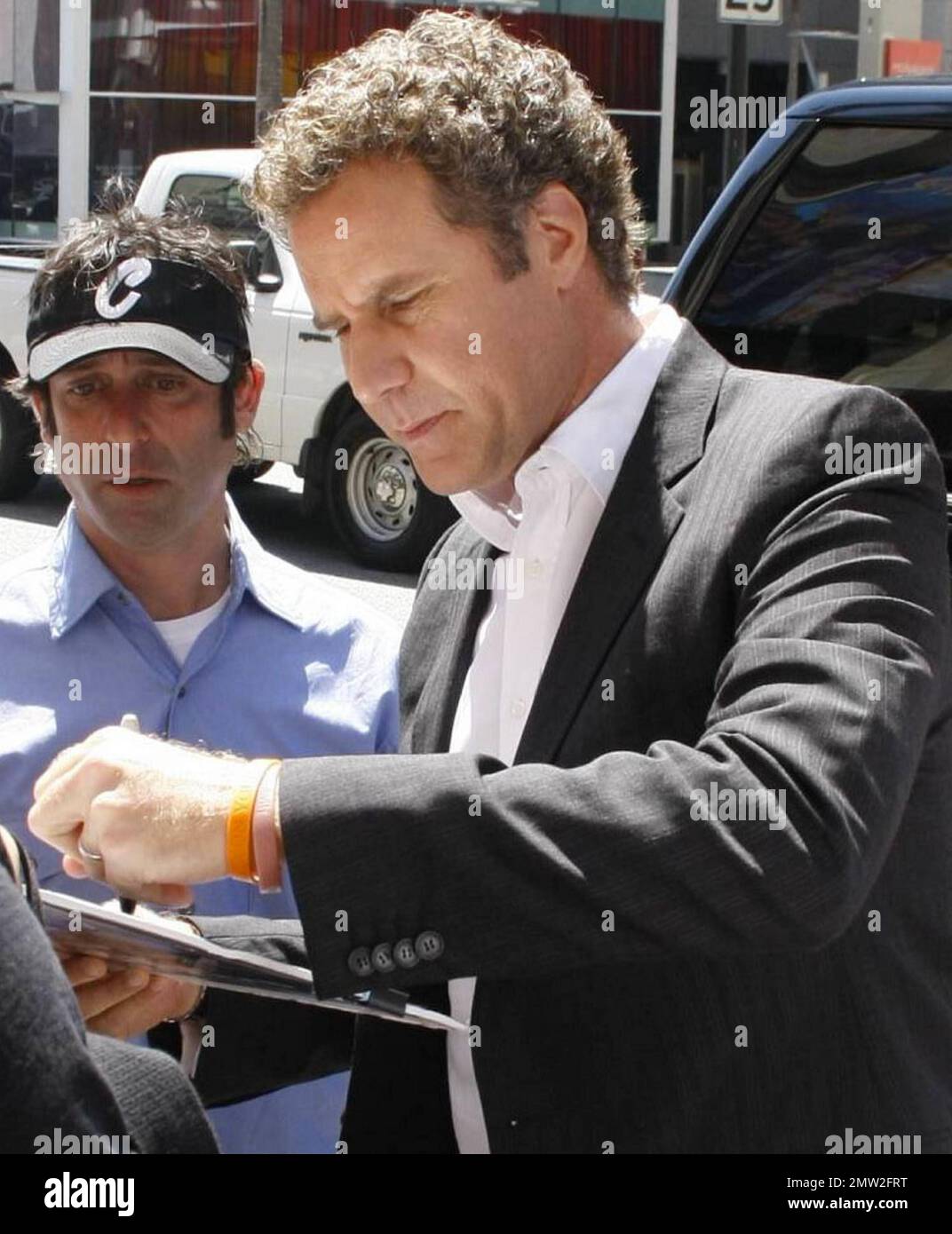 Actor Will Ferrell signs autographs, shakes hands with fans and smiles ...