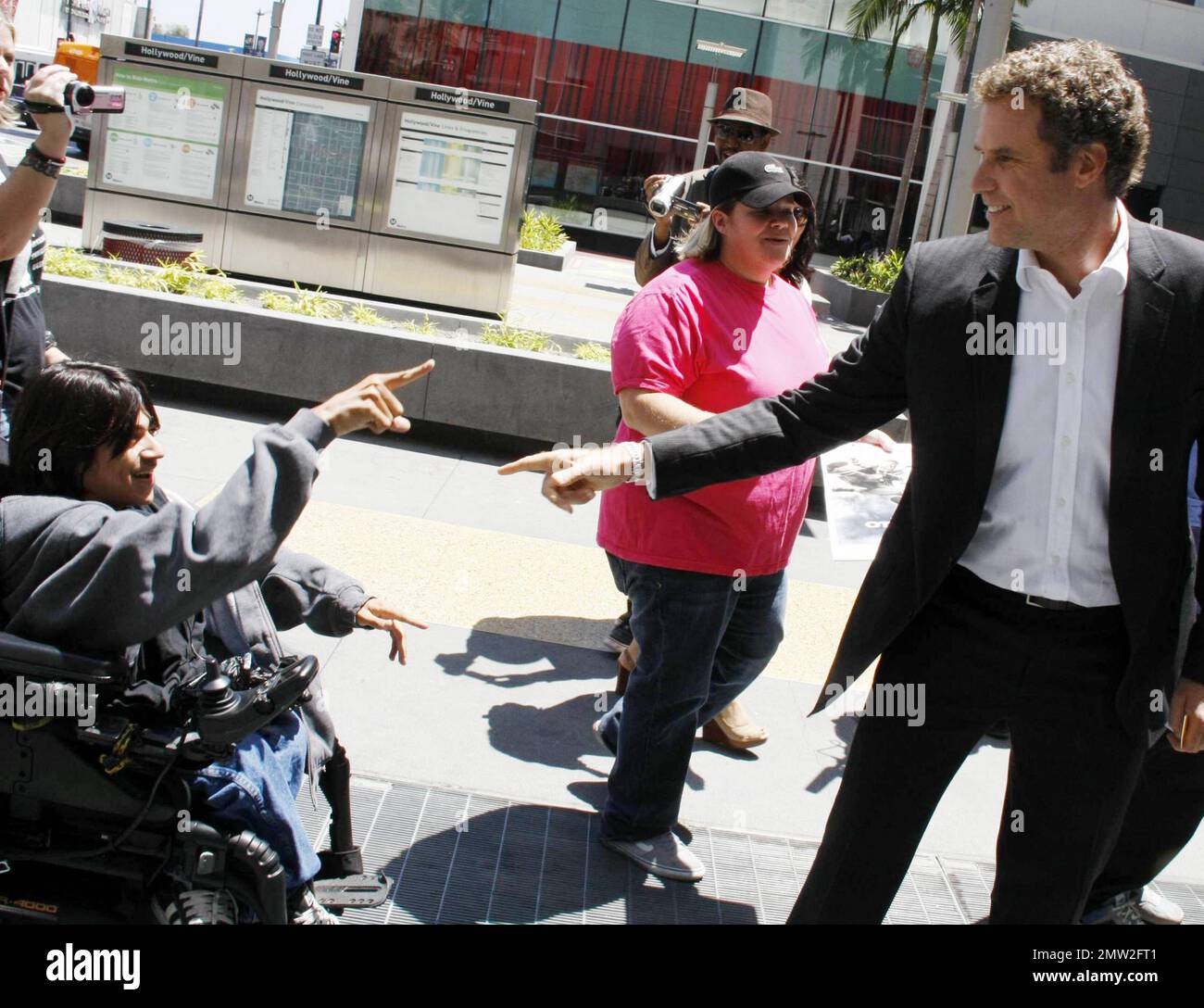 Actor Will Ferrell signs autographs, shakes hands with fans and smiles ...