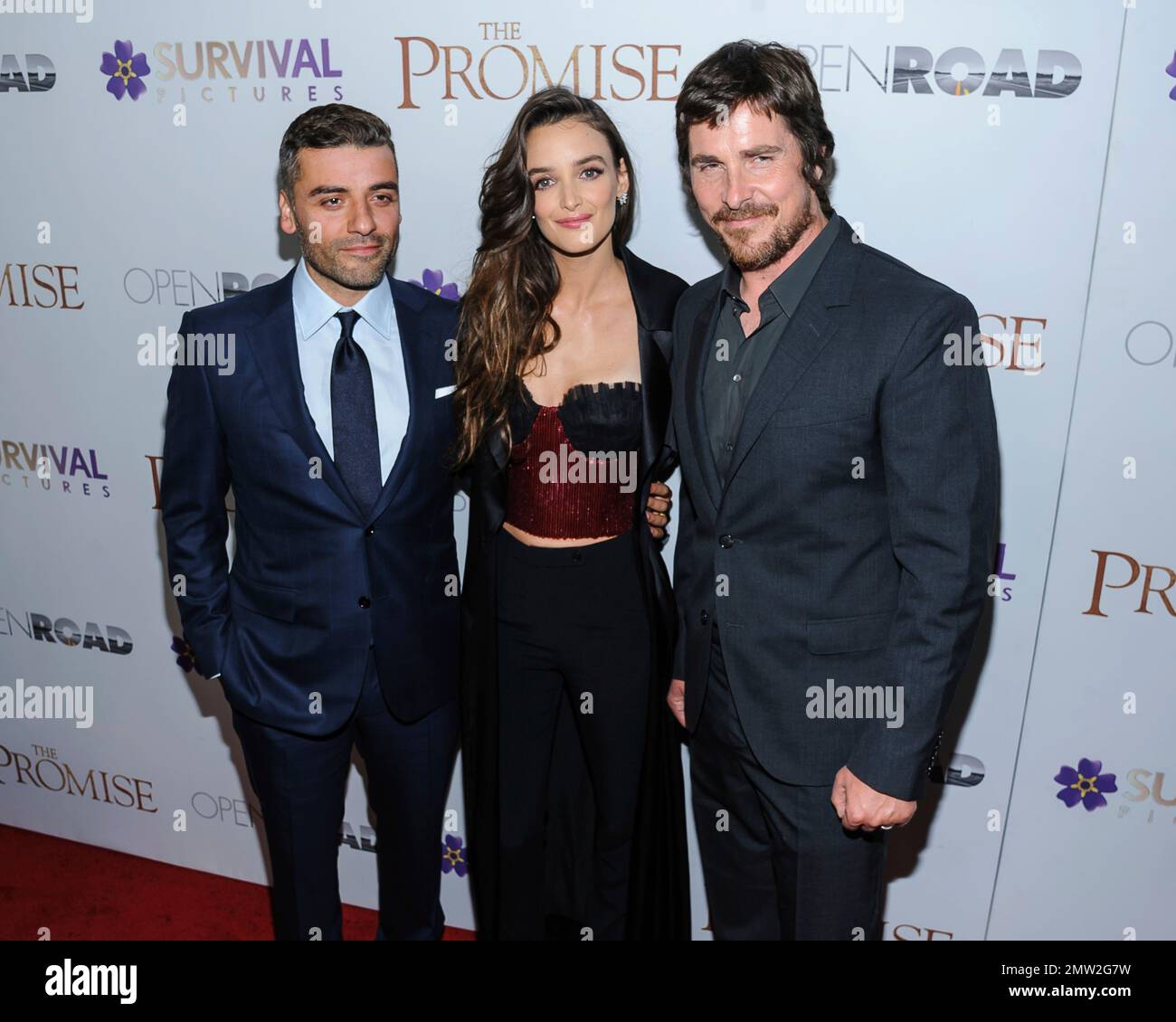 Oscar Isaac, from left, Charlotte Le Bon, and Christian Bale attend the ...