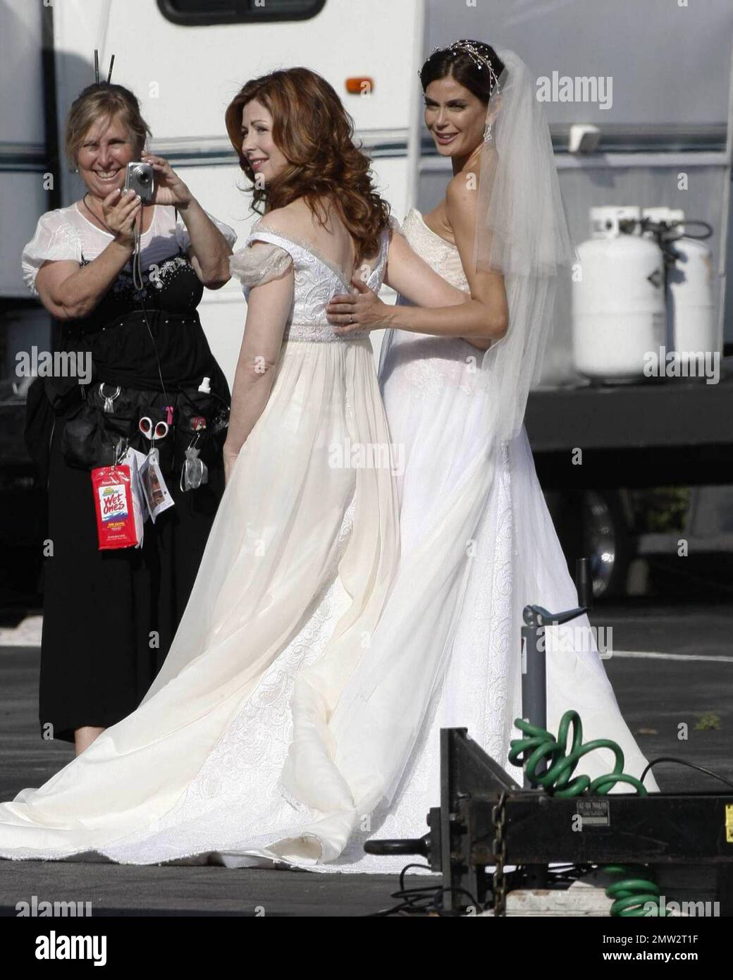 Teri Hatcher dons a wedding gown to film a scene for Desperate Housewives. Also on set were Eva ...
