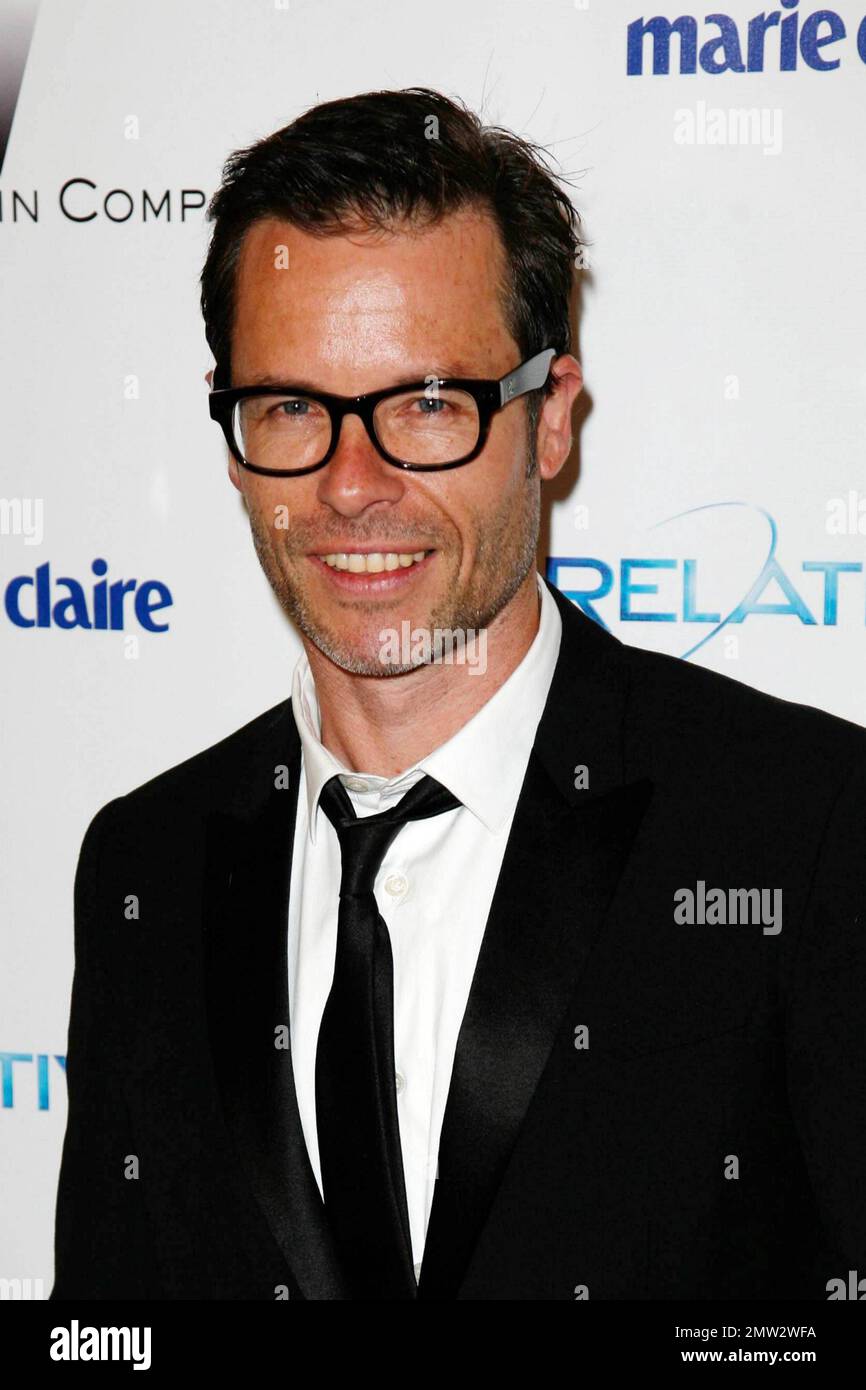 Guy Pearce poses for photographers at The Weinstein Company and ...