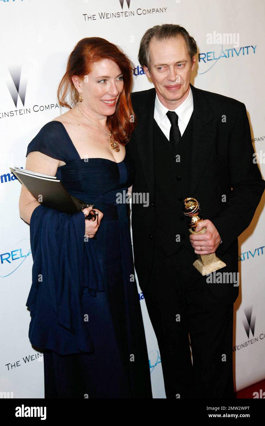 Winner Steve Buscemi and wife Jo Andres pose for photographers at The ...