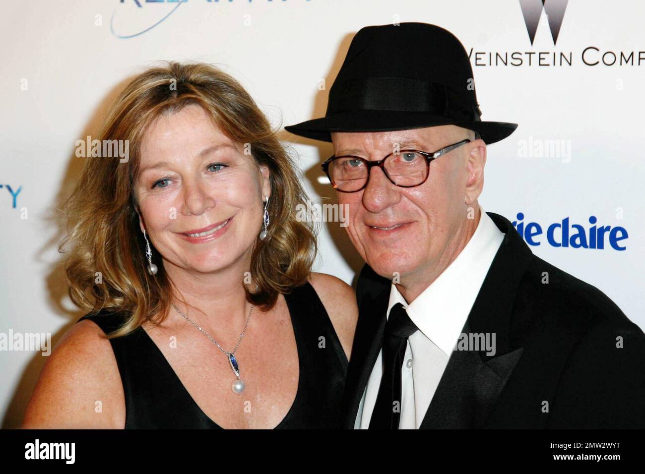 Geoffrey Rush and Jane Menelaus pose for photographers at The Weinstein ...