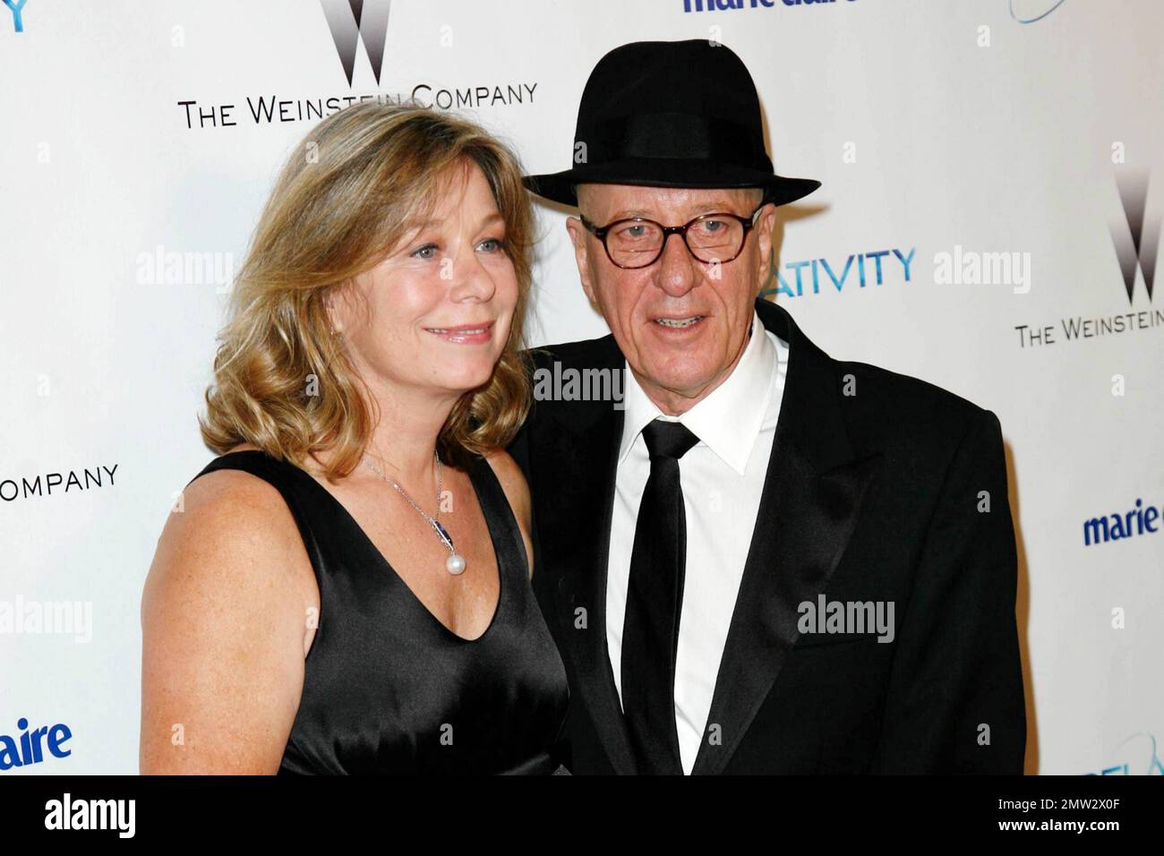 Geoffrey Rush and Jane Menelaus pose for photographers at The Weinstein ...