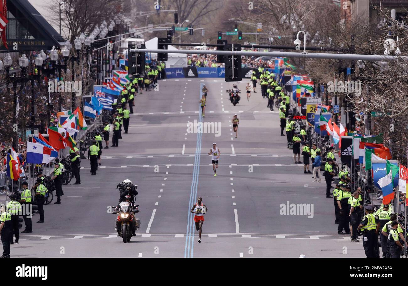 Geoffrey Kirui, of Kenya, leads Galen Rupp, of the United States, as he ...