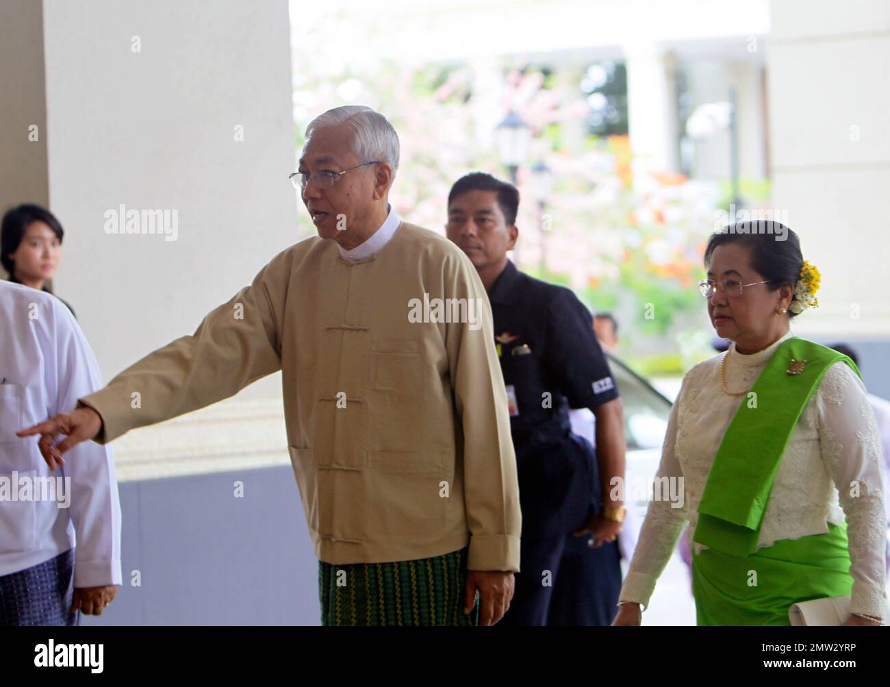 Myanmar's President Htin Kyaw, left and his wife Su Su Lwin, right ...