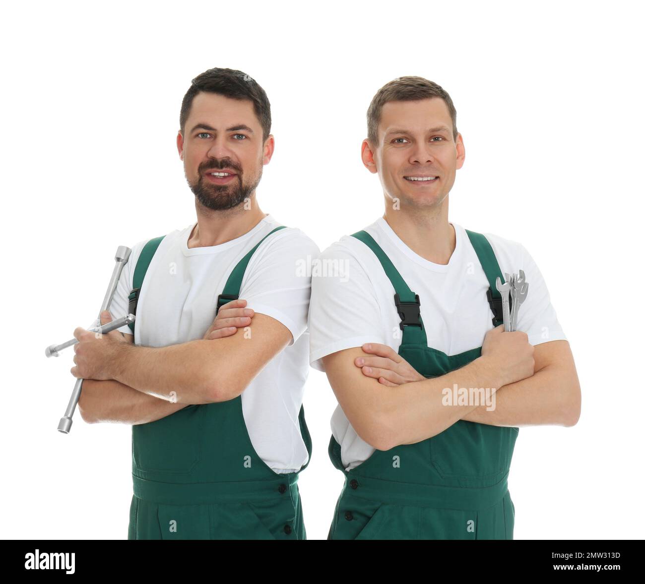 Portrait of professional auto mechanics on white background Stock Photo ...