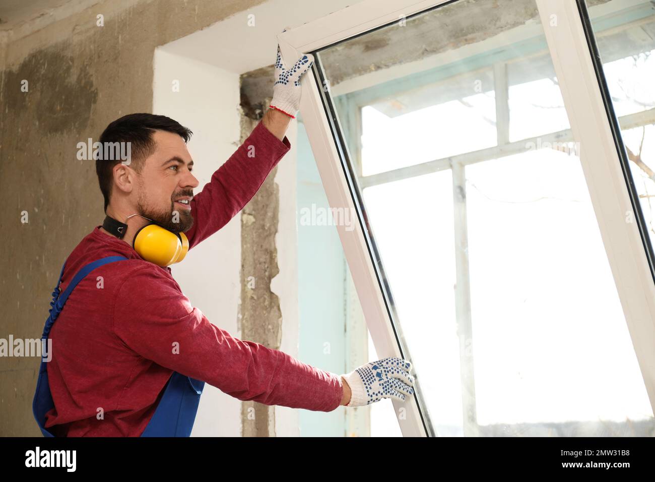 Installing window in apartment hi-res stock photography and images - Alamy