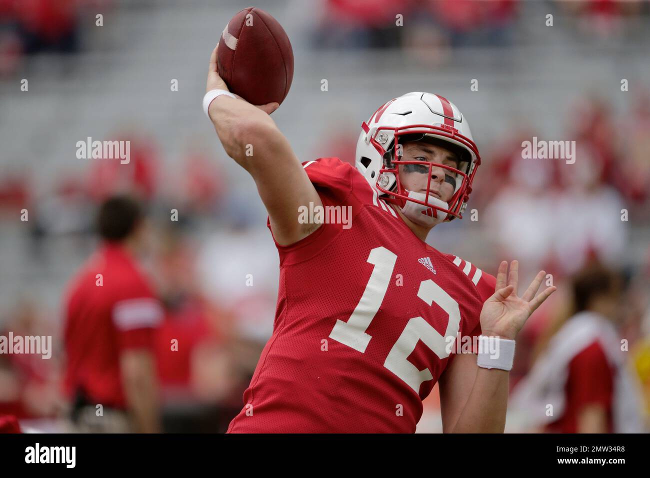 Nebraska quarterback Patrick O'Brien (12) warms up before the annual ...