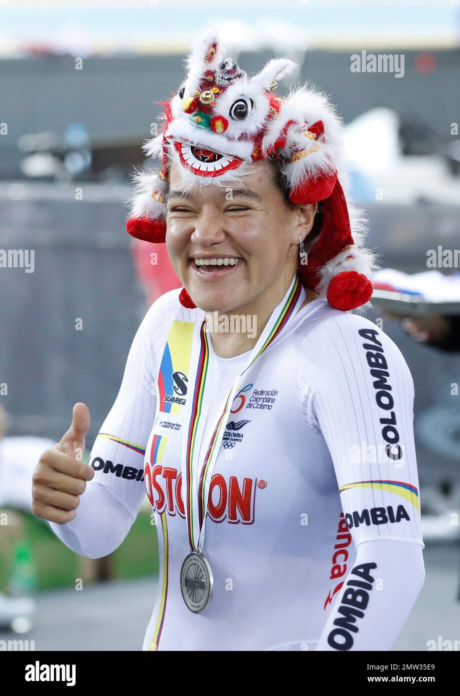 Martha Bayona Pineda of Colombia holds her silver medal on the podium ...
