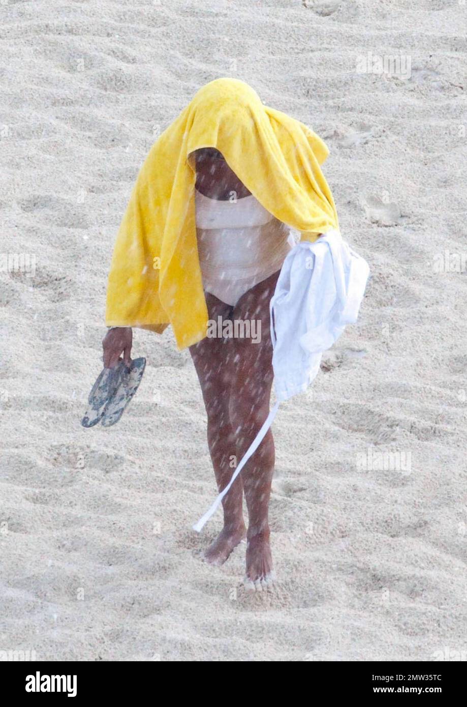 EXCLUSIVE!! R&B singer Whitney Houston, wearing a white swimsuit ...