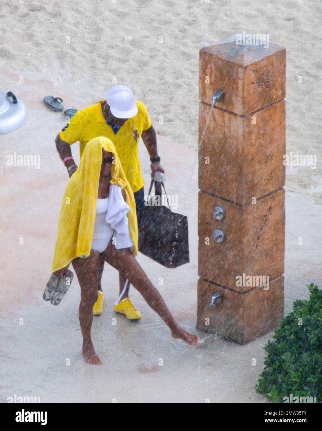 EXCLUSIVE!! R&B singer Whitney Houston, wearing a white swimsuit ...