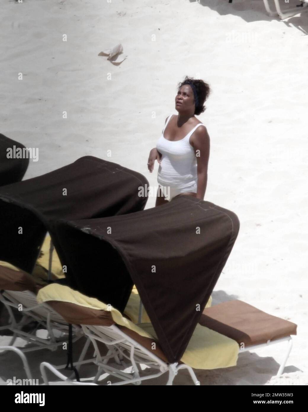 EXCLUSIVE!! R&B singer Whitney Houston, wearing a white swimsuit ...