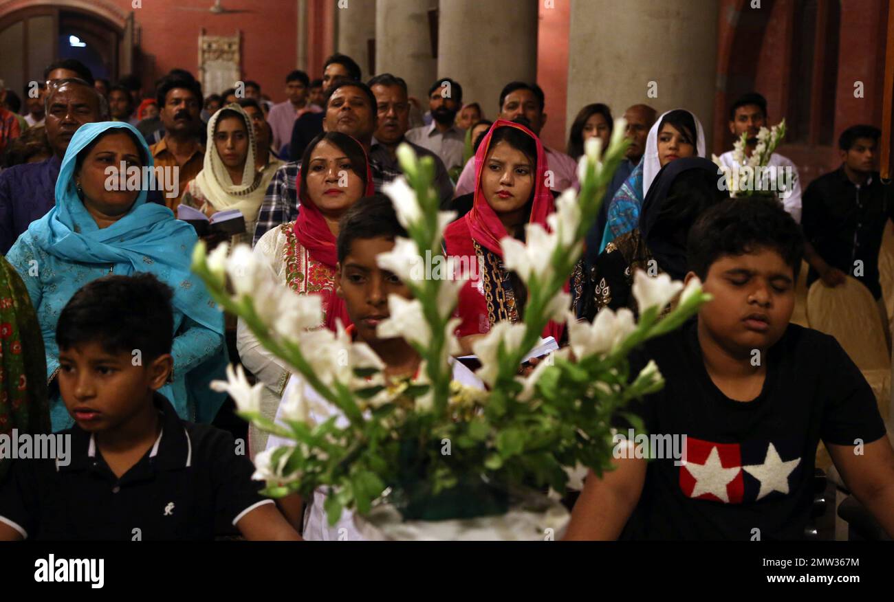 Pakistani Christians attend early morning Easter service at Cathedral ...