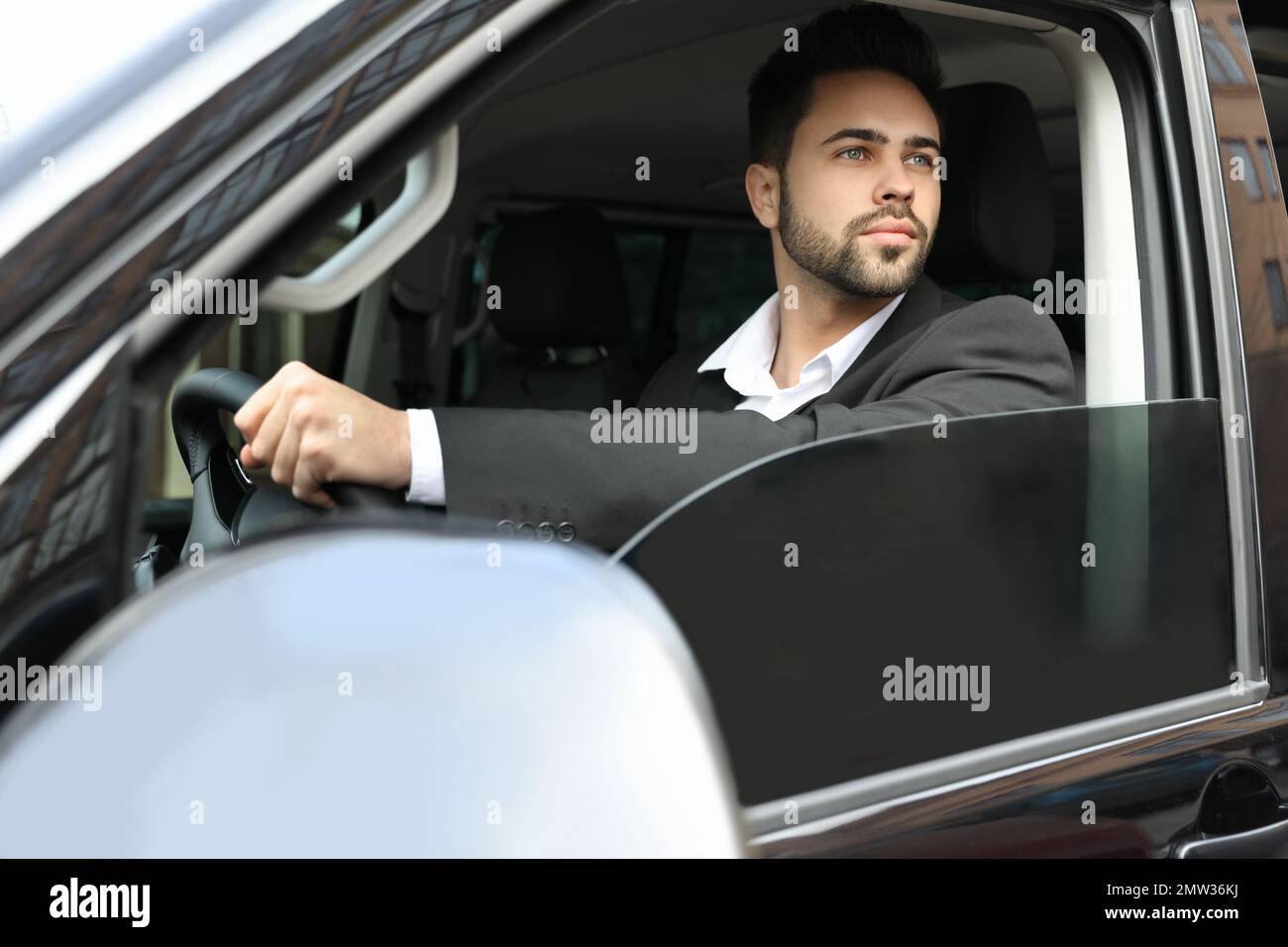 Handsome guy driving van hi-res stock photography and images - Alamy