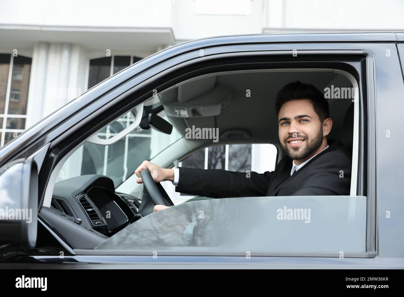 Handsome guy driving van hi-res stock photography and images - Alamy